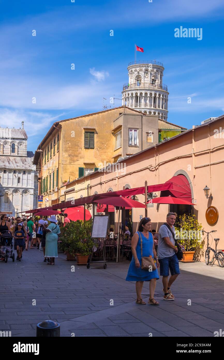 Pisa, Italy - August 14, 2019: Old historic shopping street with local ...