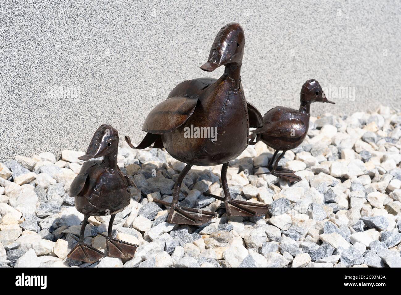 A mummy and two baby duck decorative art sculptures in recycled metal ...