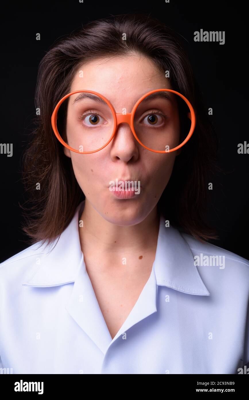 Portrait of young beautiful woman doctor with short hair Stock Photo ...