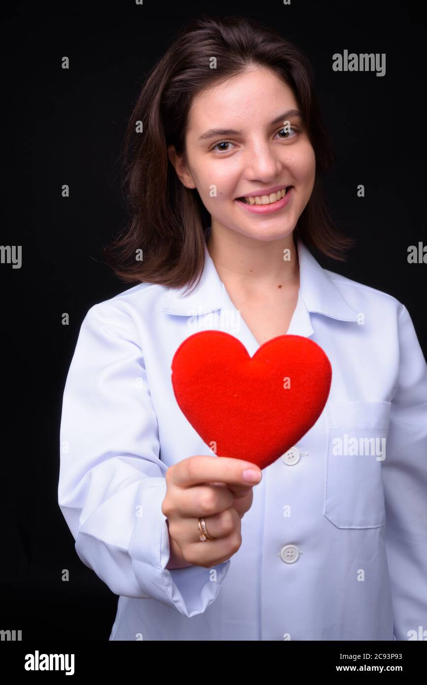 Portrait of young beautiful woman doctor with short hair Stock Photo ...
