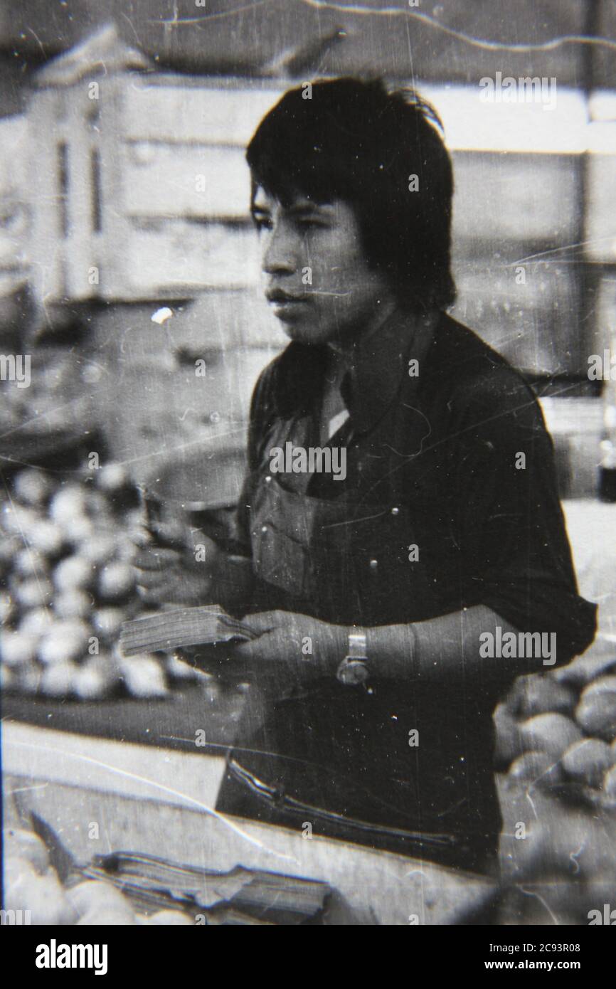 Fine 70s vintage black and white street photography of a street vendor ...