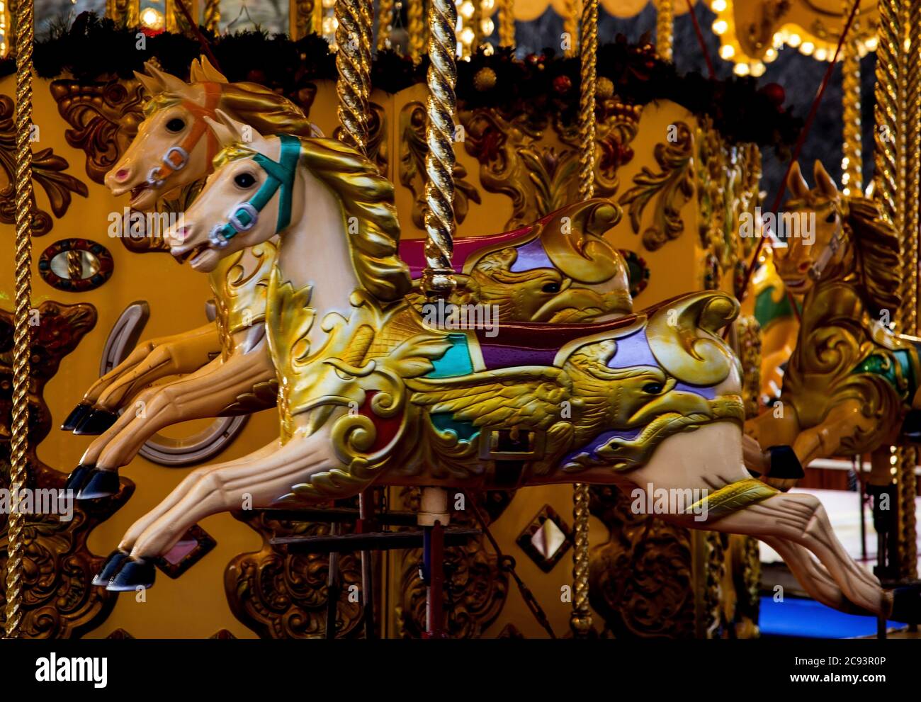 Colourful carousel horses at a country fairground Stock Photo - Alamy