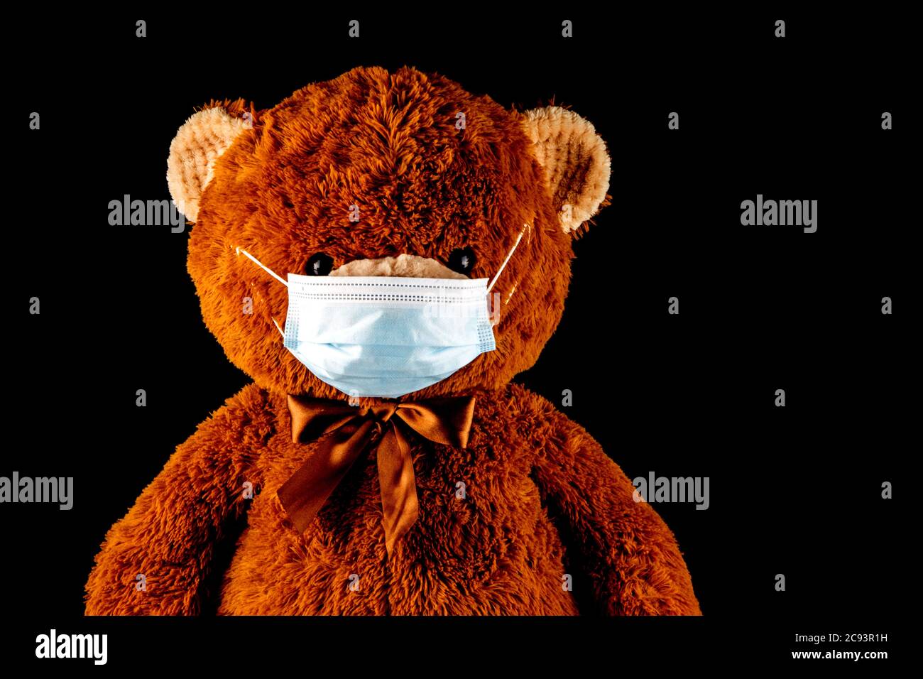 Teddy bear wearing bow tie hi-res stock photography and images - Alamy