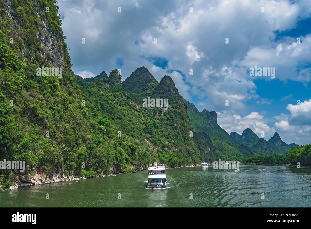 Yangshuo, China - August 2019 : Sightseeing boat carrying tourists ...