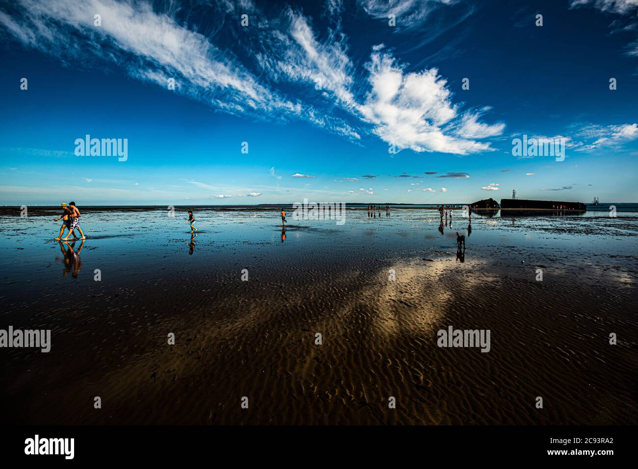 Clouds reflecting on water Stock Photo - Alamy