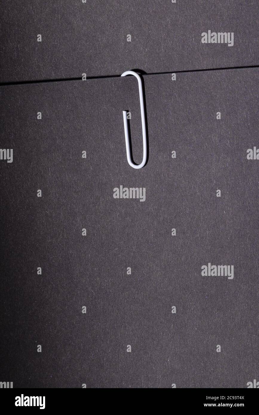 Paper clips on blank document Stock Photo - Alamy