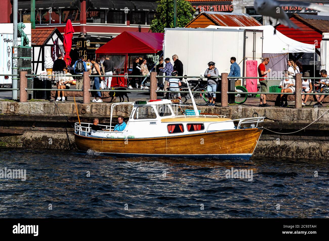 A veteran small pleasure craft, Oscar, at Torget, in the inner port of ...