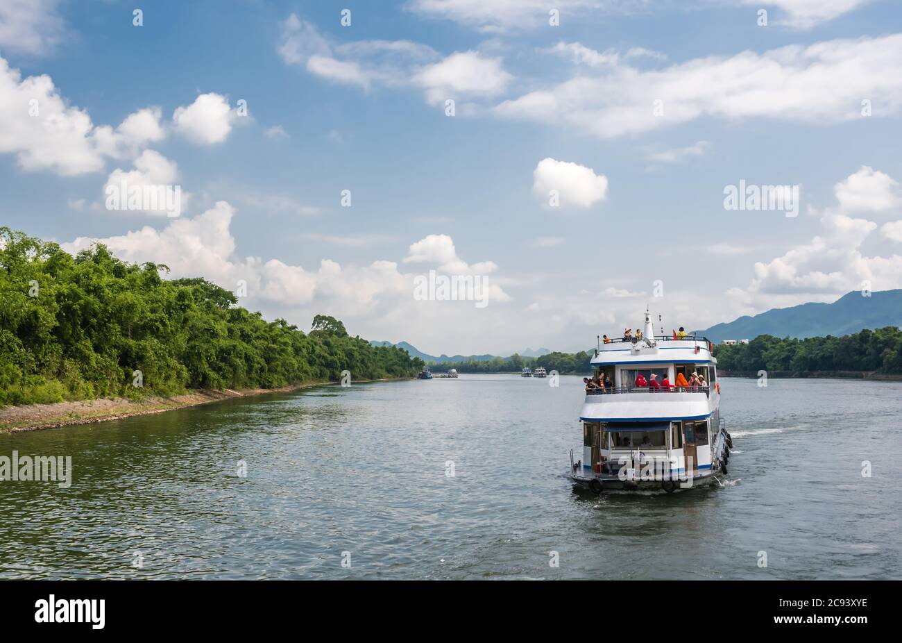 Yangshuo, China - August 2019 : Sightseeing boat full of tourists ...