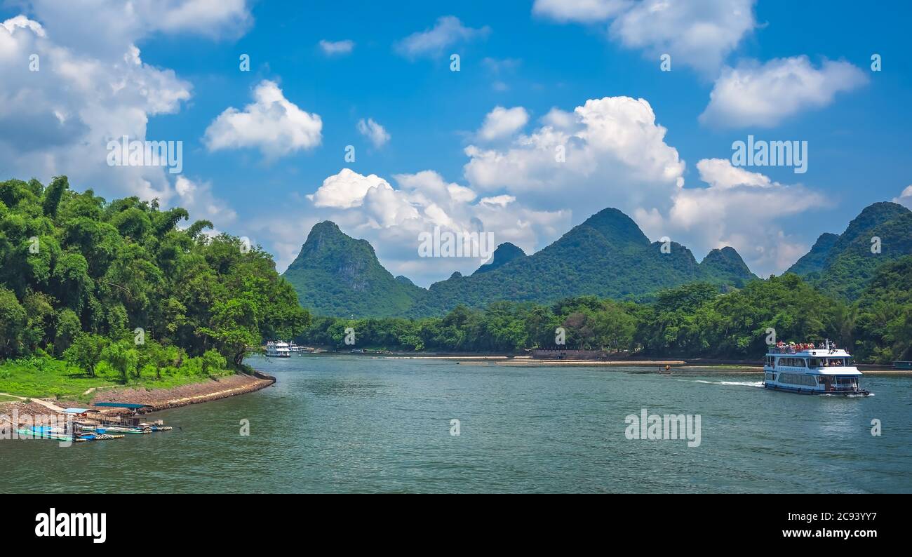 Yangshuo, China - August 2019 : Sightseeing boat carrying tourists ...