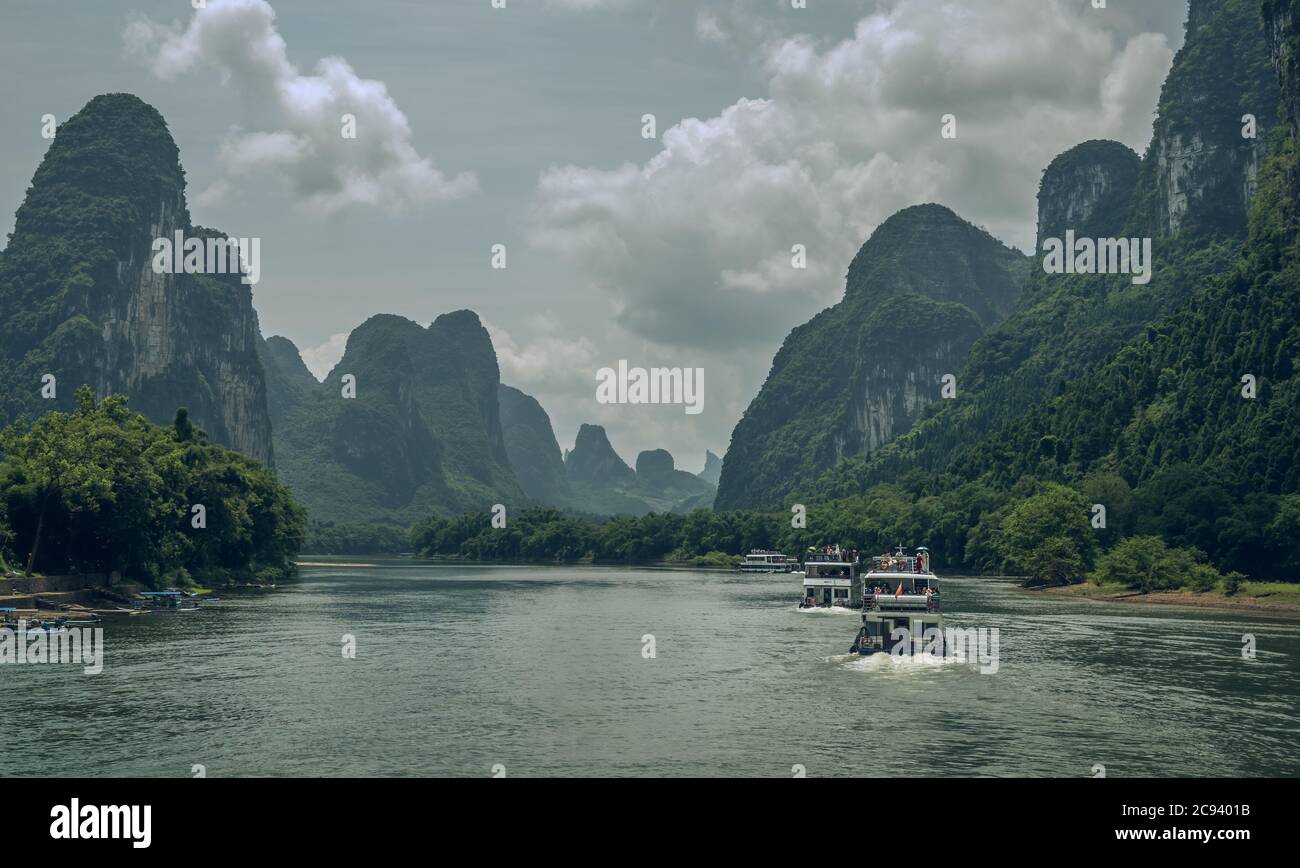 Yangshuo, China - August 2019 : Sightseeing boat carrying tourists ...