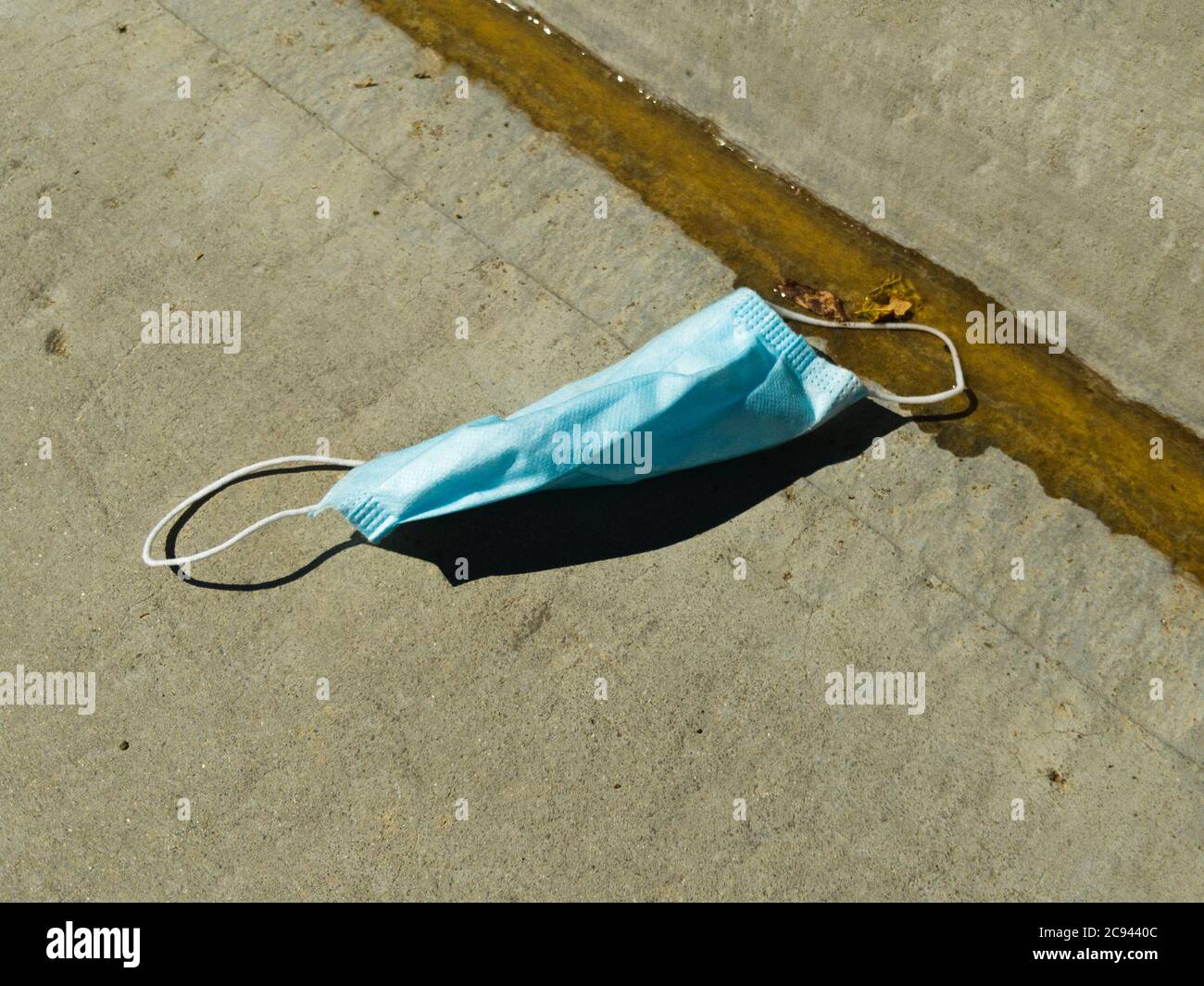 Laying in a gutter hi-res stock photography and images - Alamy