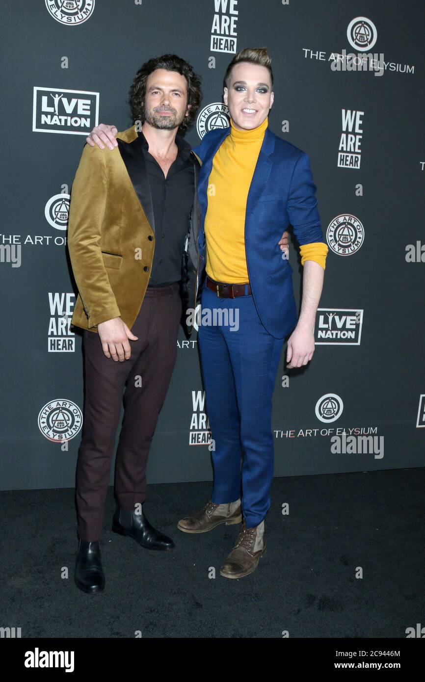 LOS ANGELES - JAN 4: Daniel Hall and Guest at the Art of Elysium Gala ...