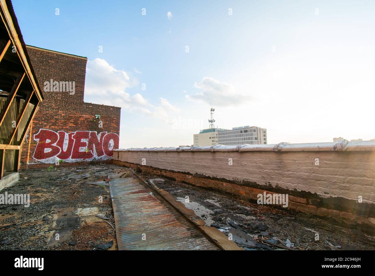 A Rooftop View on top of an Abandoned Building With a Graffiti Tag That ...