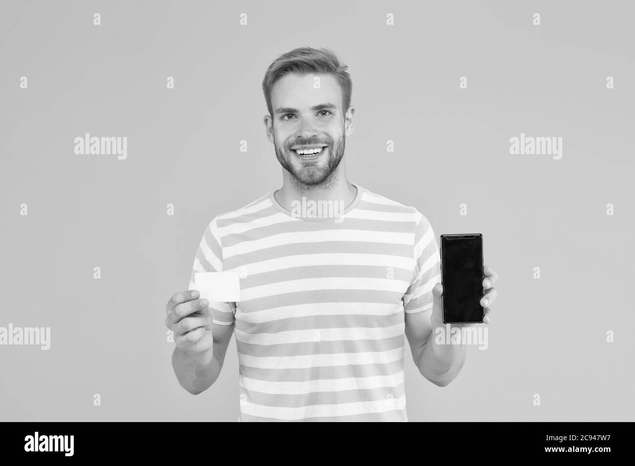 Mobile handout Black and White Stock Photos & Images - Alamy