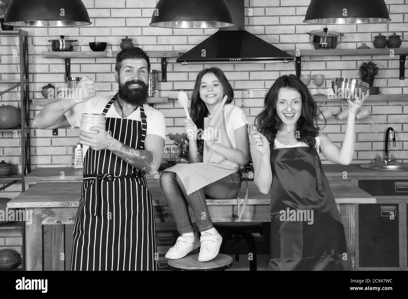 Family fun. mothers day. cooking healthy food at home. Family Preparing ...