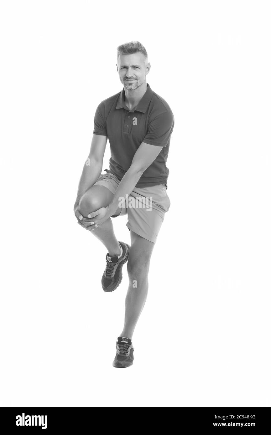 Rehabilitation following injury. Sportsman suffer from pain in knee ...