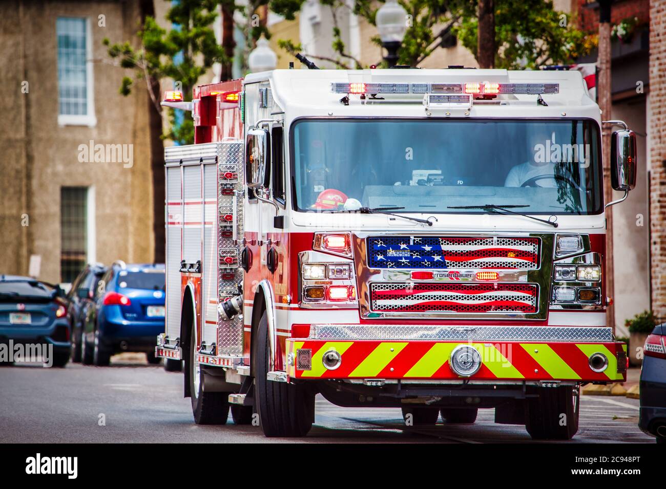 A fire engine responds to an emergency Stock Photo - Alamy