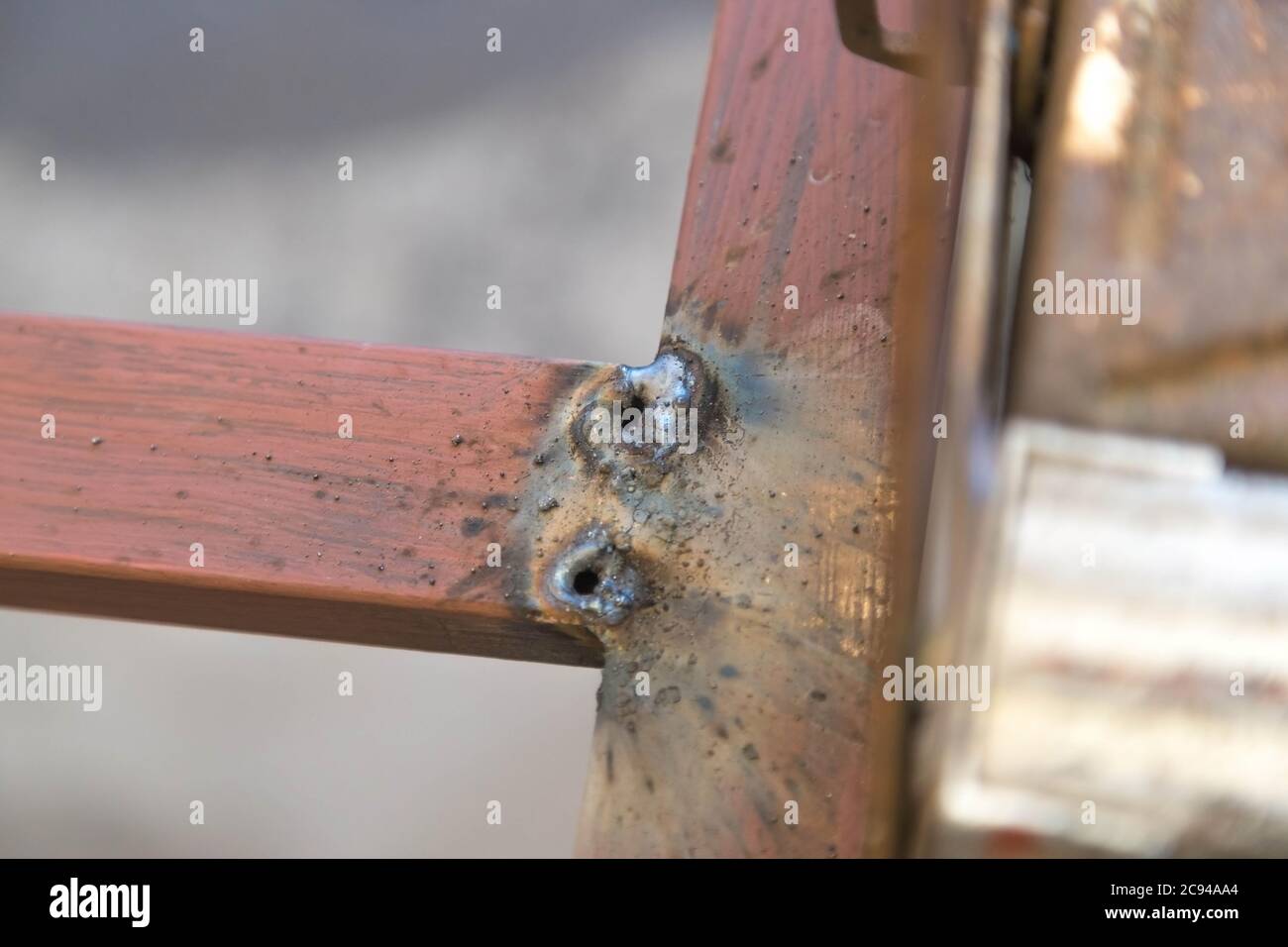 A piece of spot-welded iron. The welding result is shown Stock Photo ...