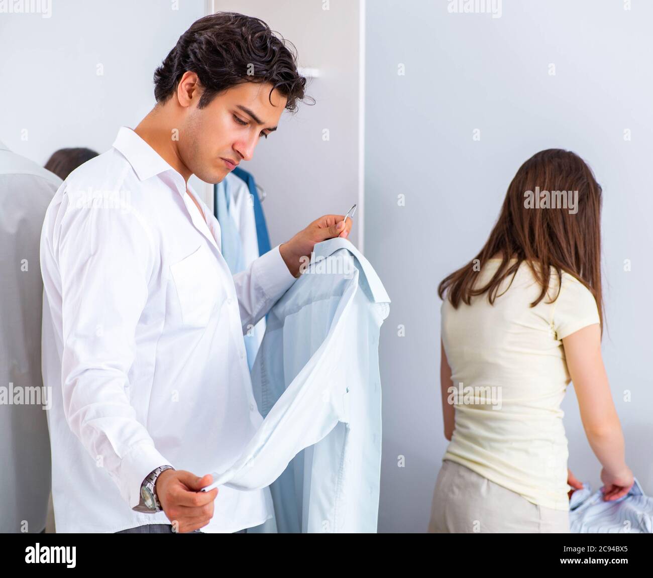The woman sees her husband off to work Stock Photo - Alamy