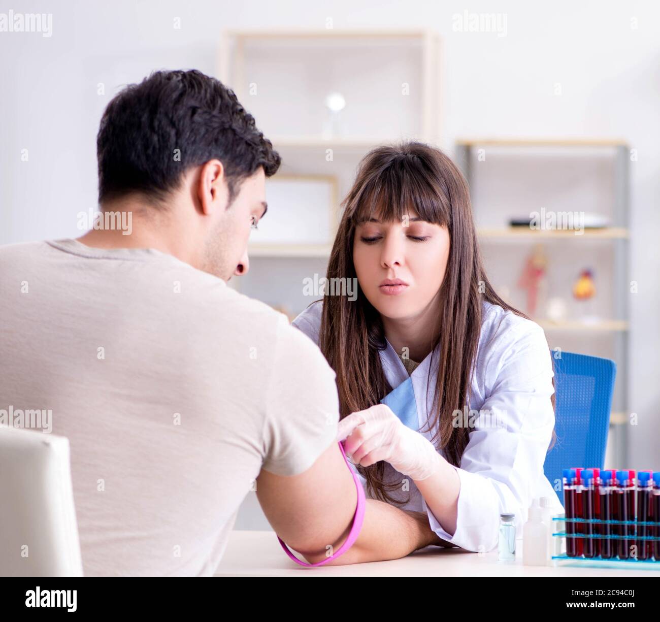 The patient during blood test sampling procedure taken for analysis ...