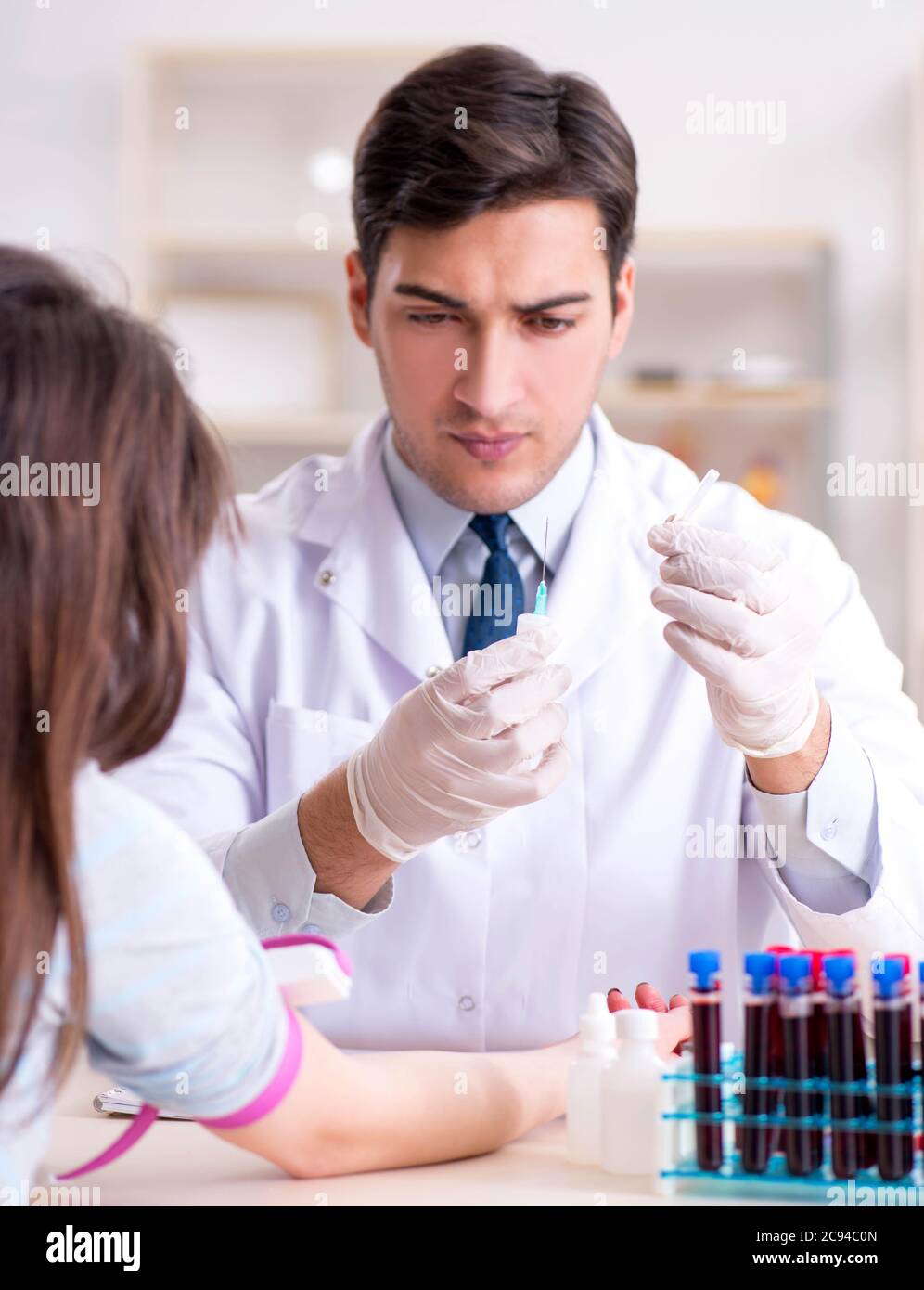 The patient during blood test sampling procedure taken for analysis ...