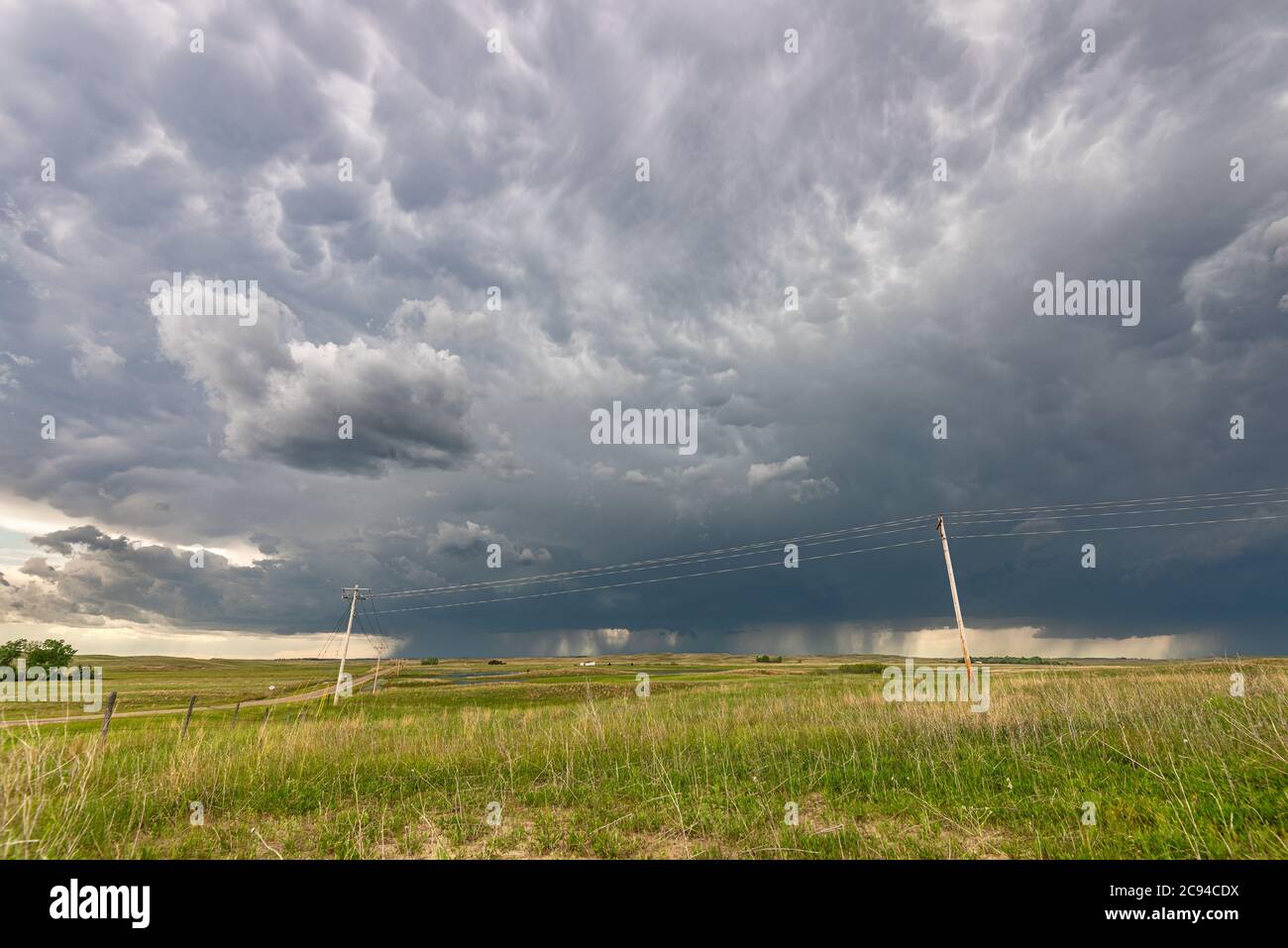 A mesocyclone weather supercell, which is a pre-tornado stage, passes ...
