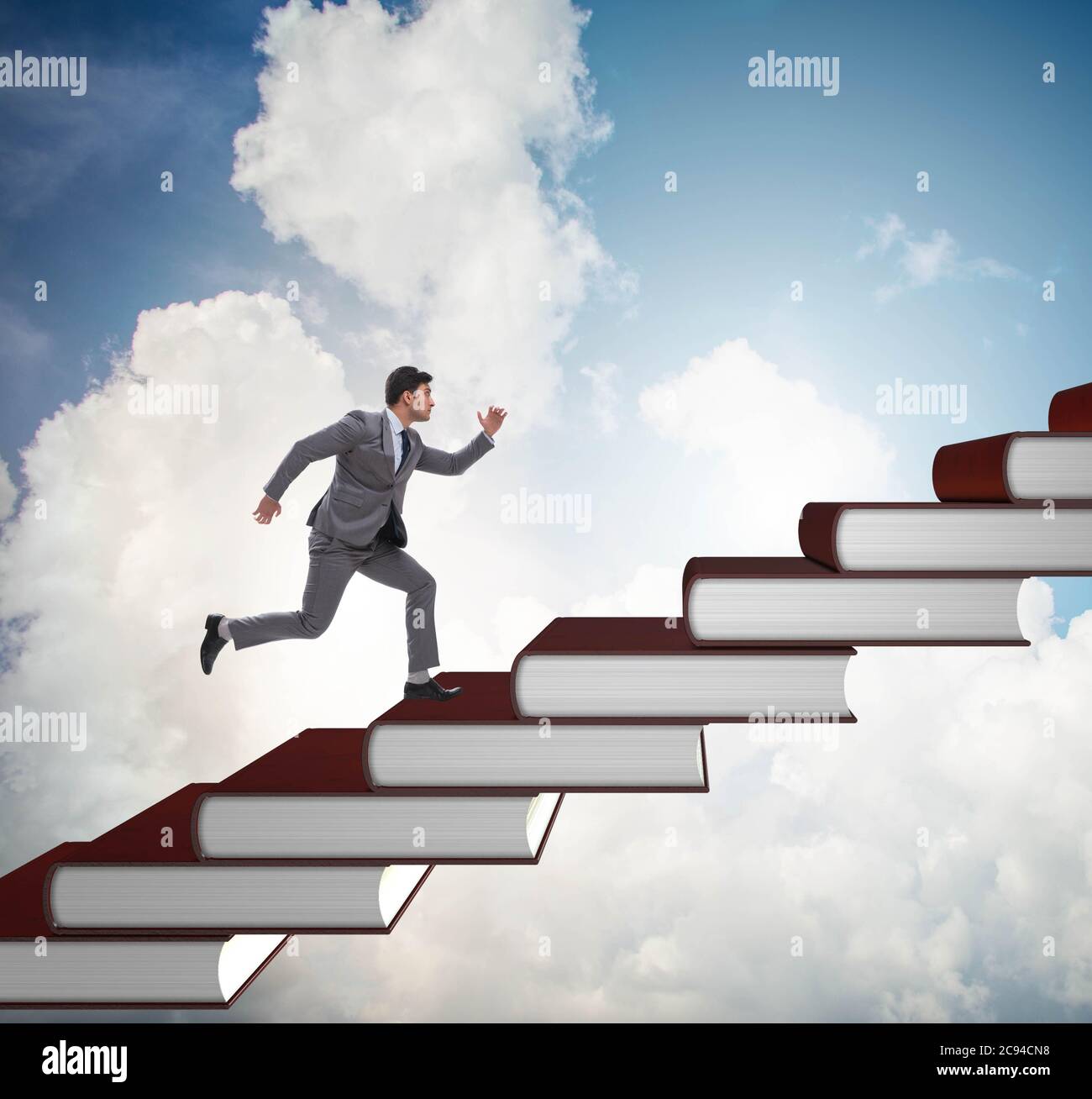 Man climbing up ladder knowledge hi-res stock photography and images ...