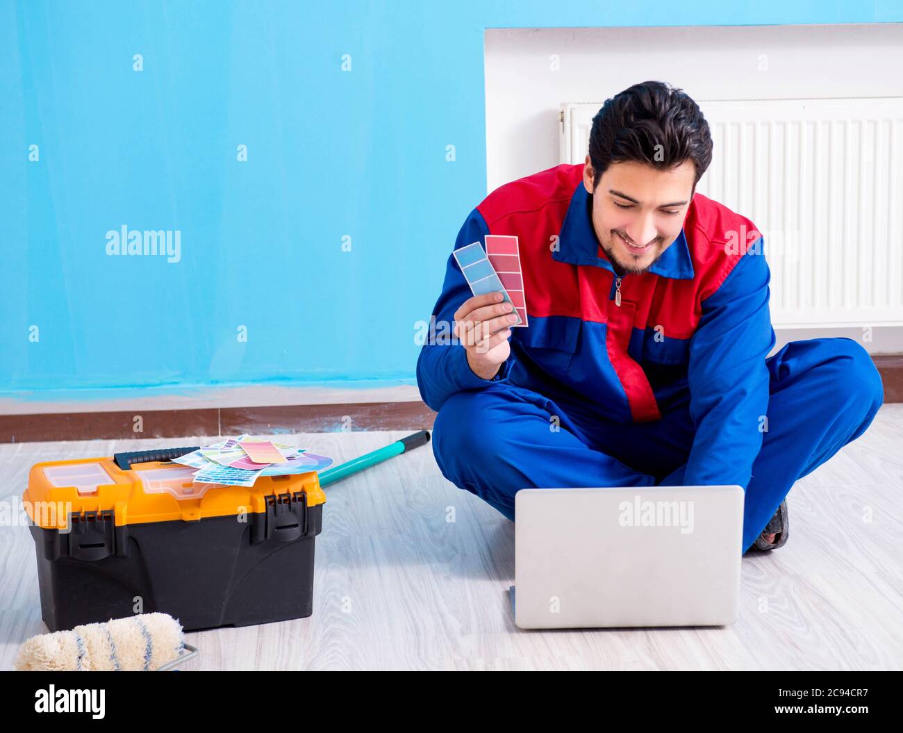 The young man doing home renovation Stock Photo - Alamy