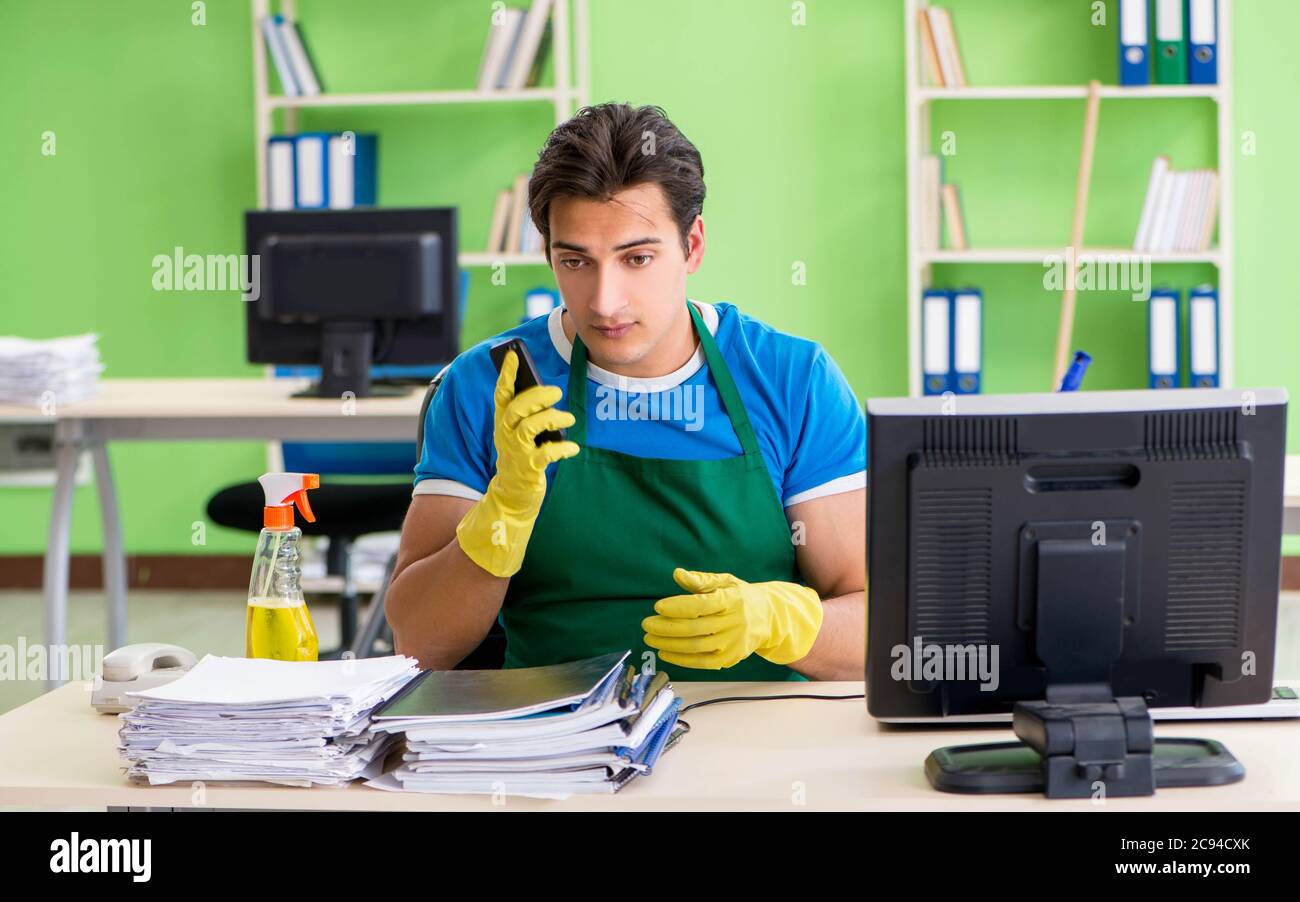 The male spy under cleaner cover stealing confidential documents Stock ...