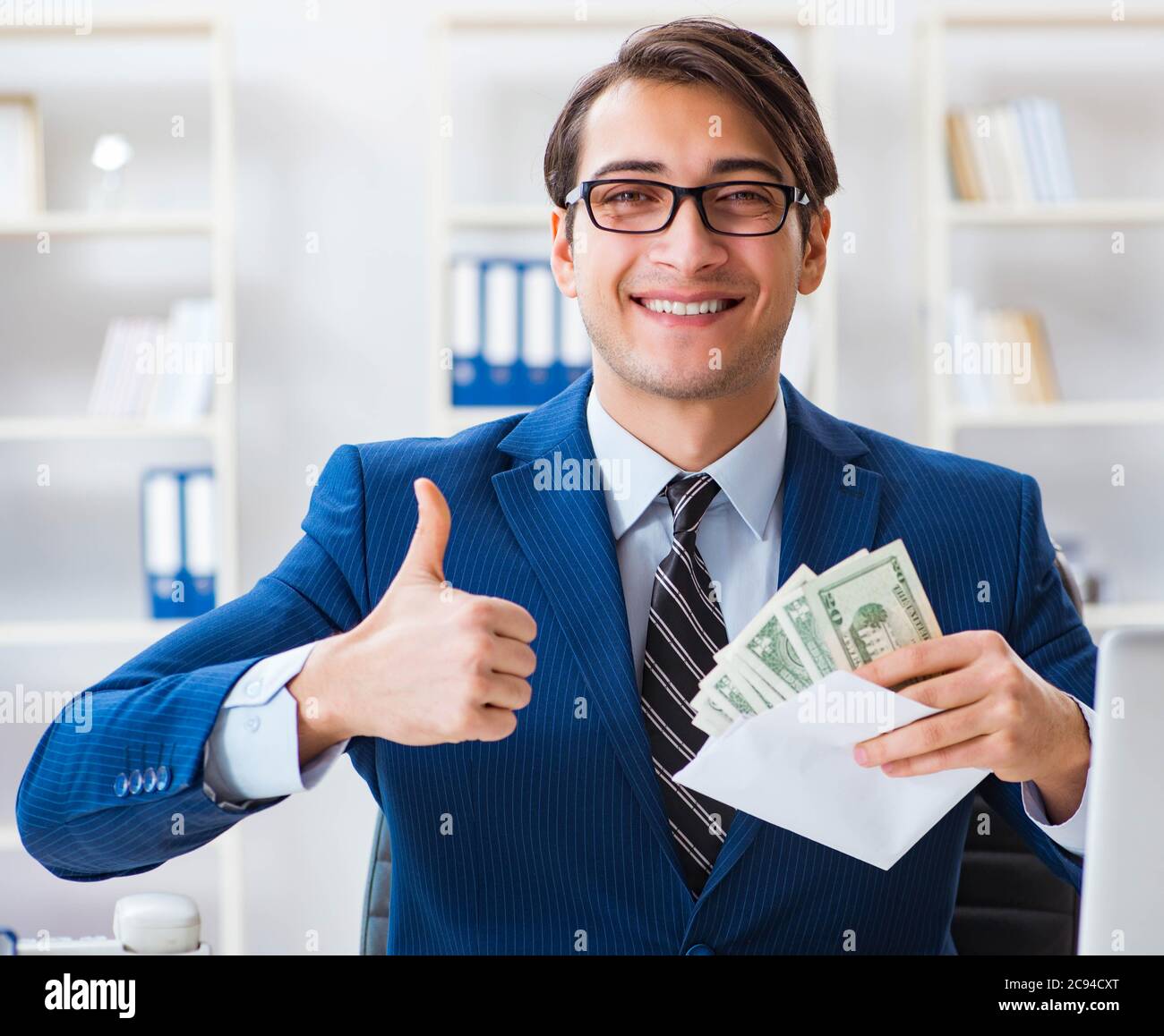 The businessman receiving his salary and bonus Stock Photo - Alamy