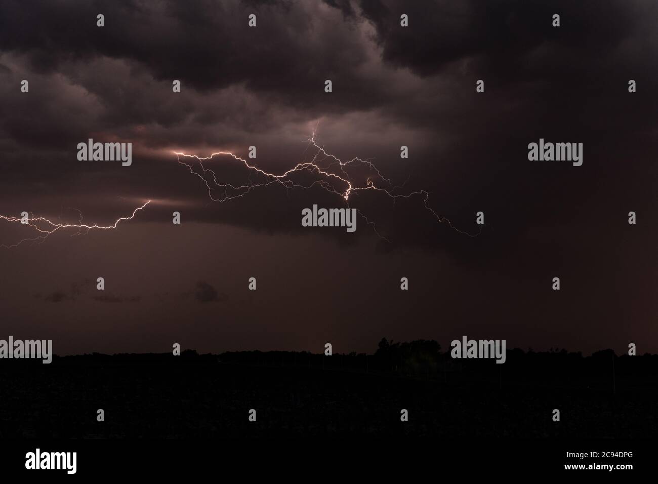 A lightning storm over the Great Plains provides a dramatic light show ...