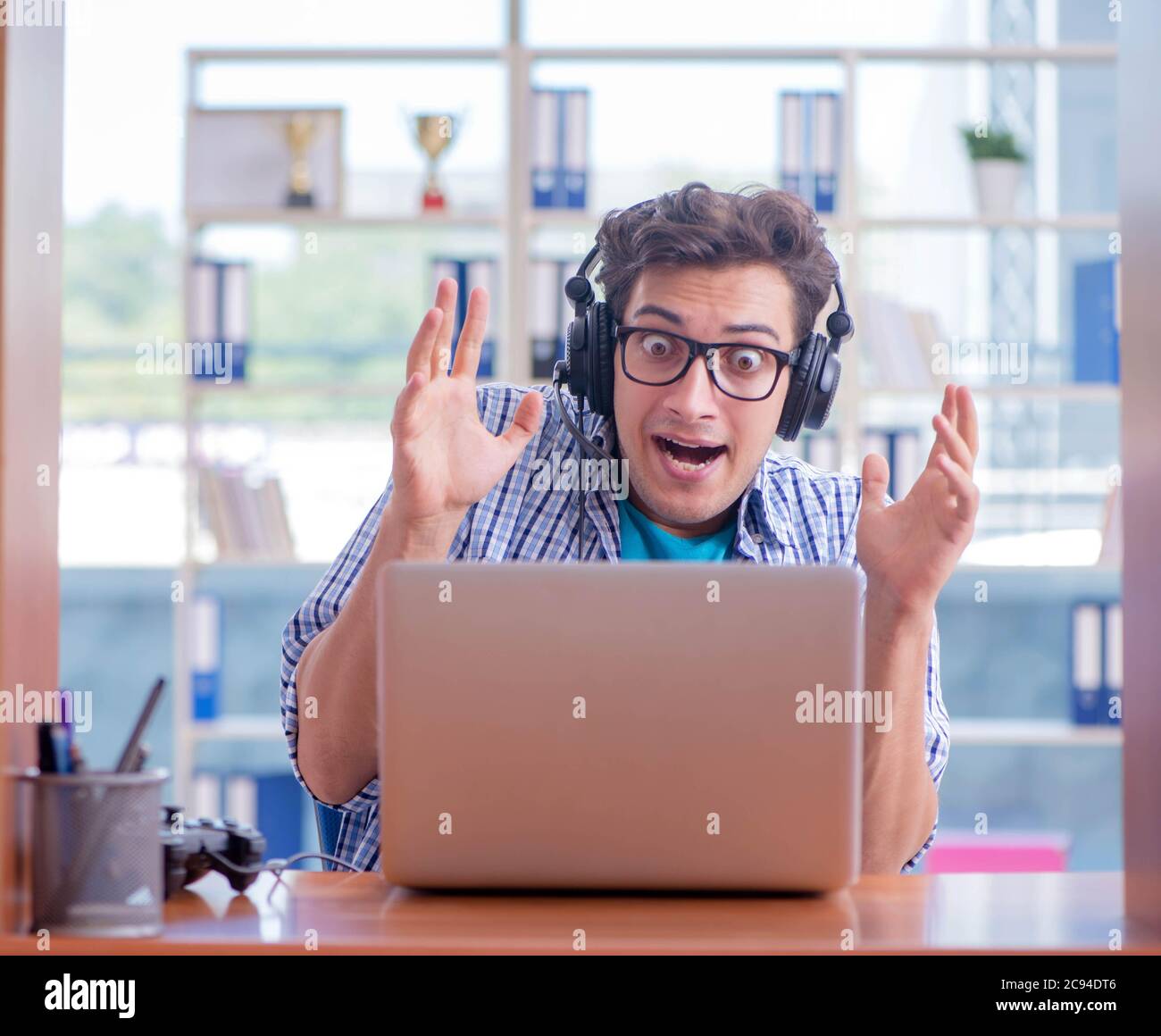 The gamer addict playing computer games at home Stock Photo - Alamy