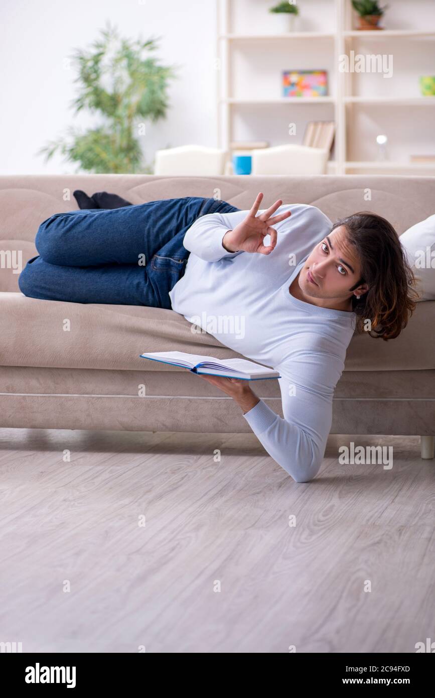 Young student preparing for exams at home Stock Photo - Alamy