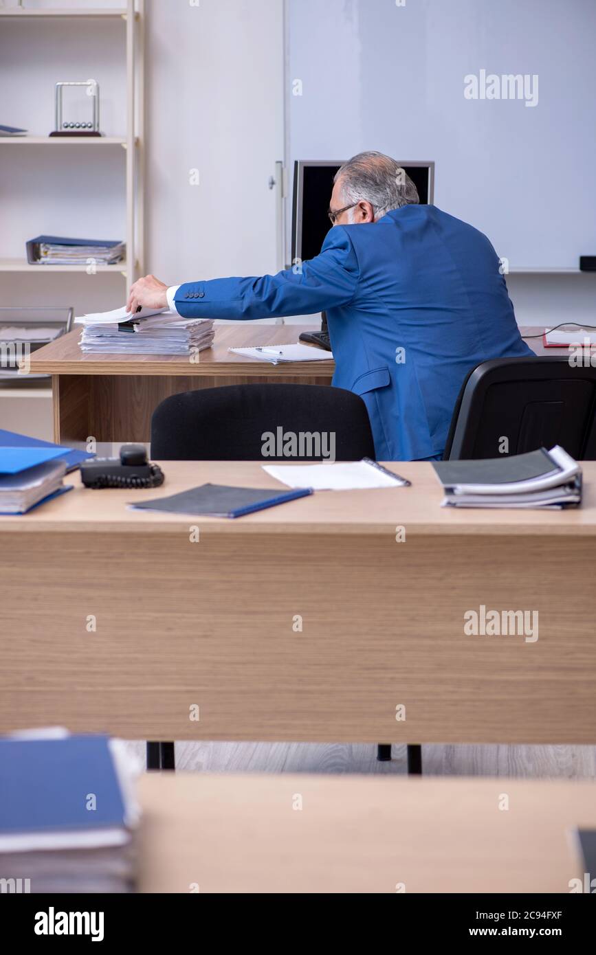 Male boss employee working in the office Stock Photo - Alamy
