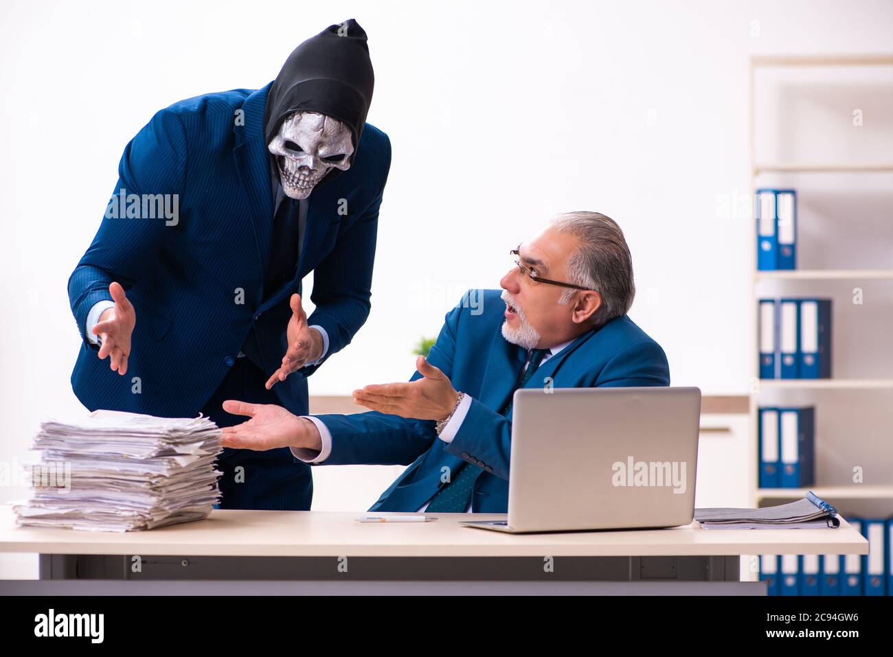 Old businessman employee making deal with the devil Stock Photo - Alamy