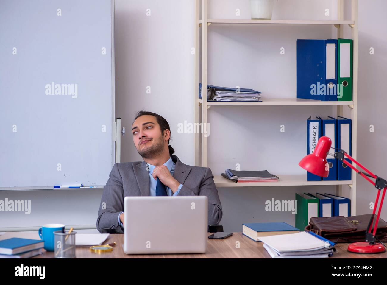 Male businessman employee working in the office Stock Photo - Alamy