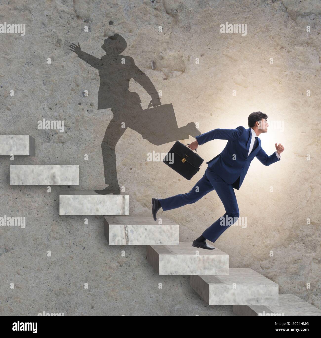 The businessman and his shadow in business concept Stock Photo - Alamy