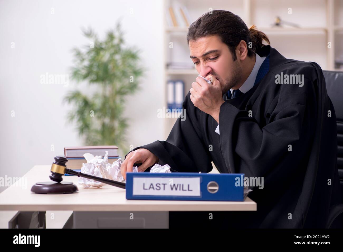 Young judge working in courthouse Stock Photo - Alamy