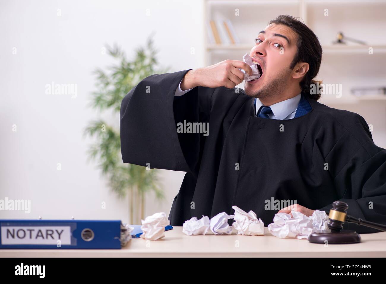 Young judge working in courthouse Stock Photo - Alamy