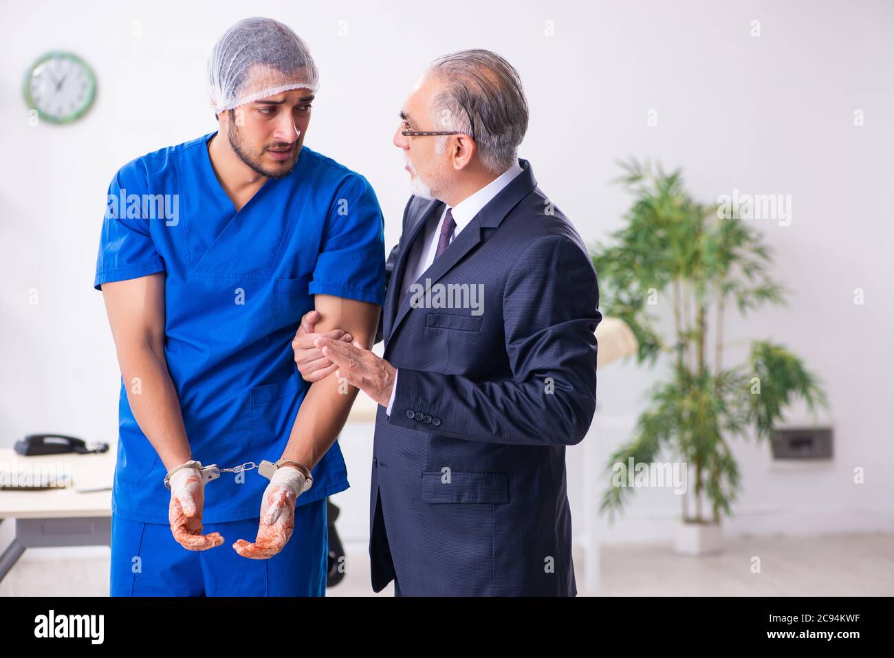 Doctor in courthouse meeting with advocate Stock Photo - Alamy