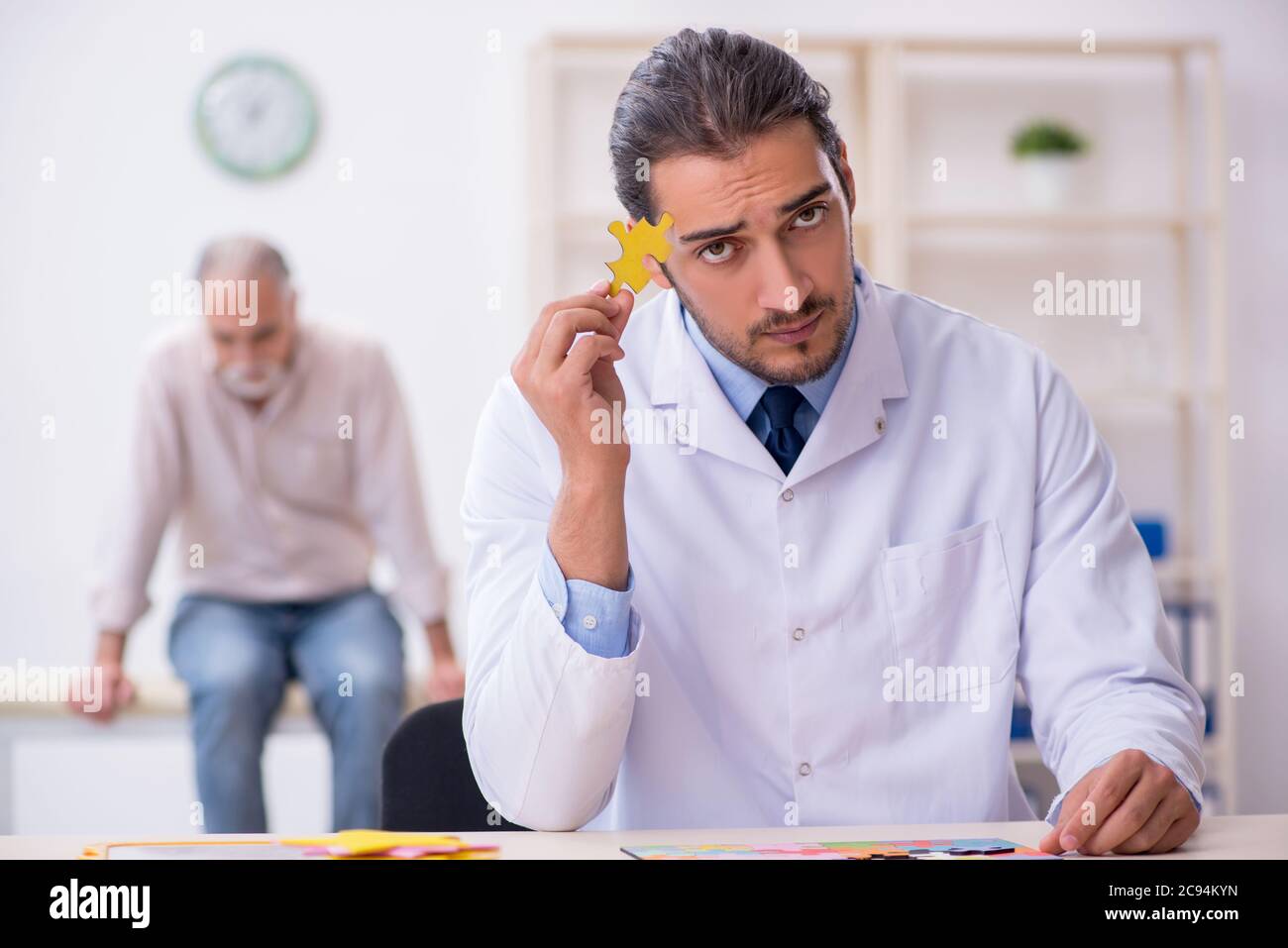 Doctor and patient suffering from the Alzheimer disease Stock Photo - Alamy
