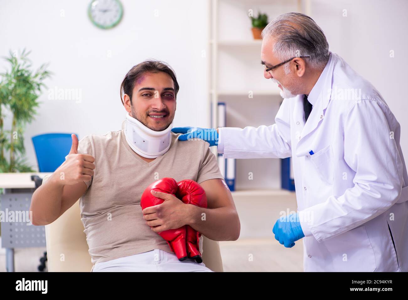 Young face injured man visiting experienced male doctor traumatologist ...