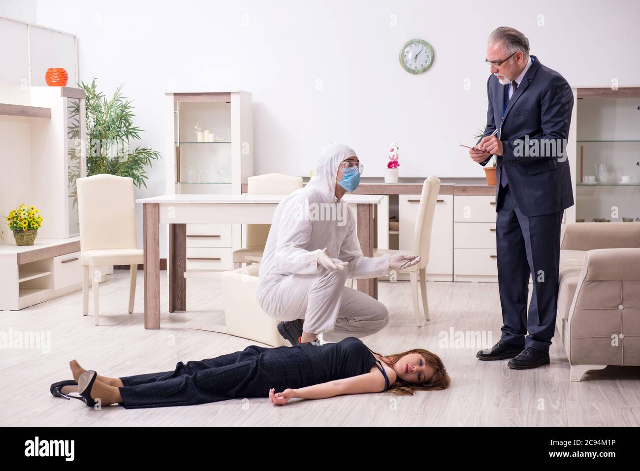 Forensic experts at the crime scene at home Stock Photo - Alamy