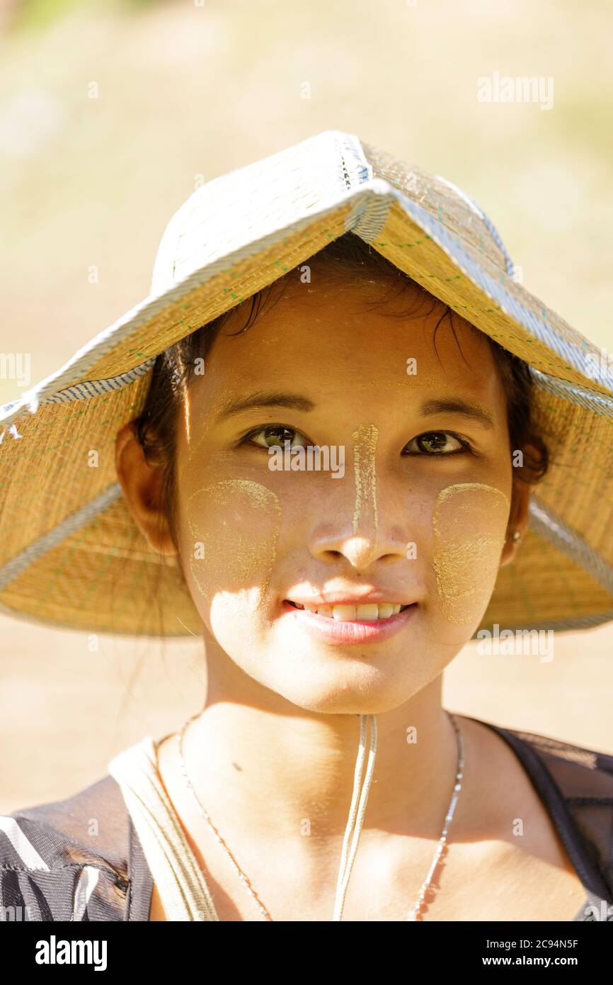 Sagaing/Myanmar-October 2nd 2019: The face with the tanaka powder of a ...