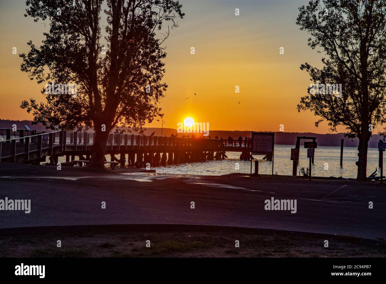 Ocean Bay sunset Stock Photo - Alamy