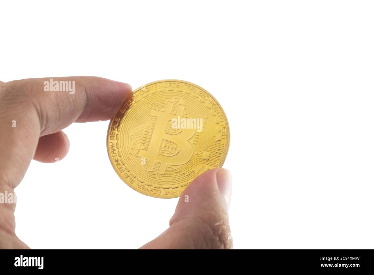 Bitcoin holding in hand isolated on white background with clipping path ...