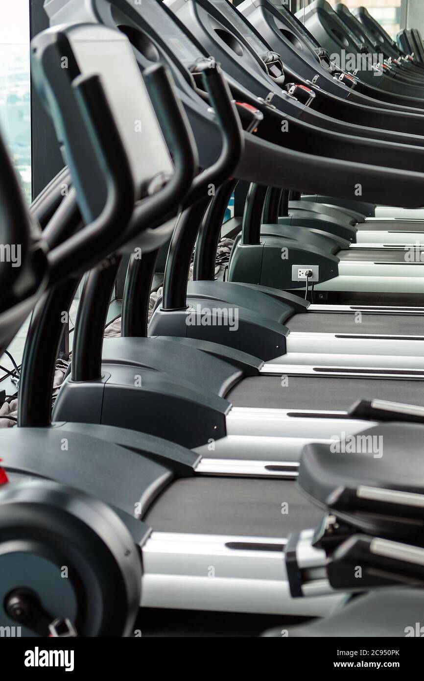 Detail image of Treadmill in fitness room background Stock Photo - Alamy