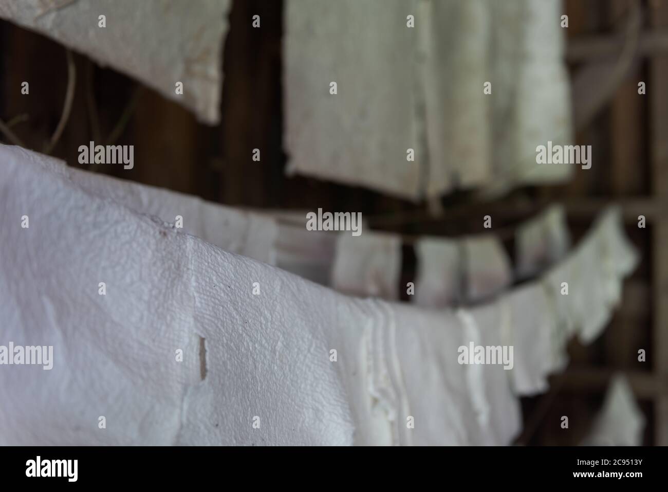 Hanging on strings hi-res stock photography and images - Alamy