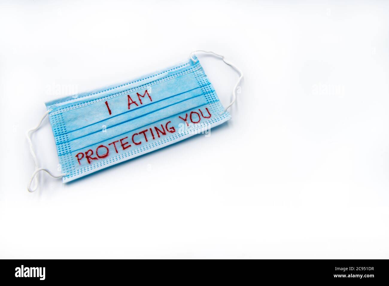 Single use medical face mask with handwritten message I Am Protecting ...