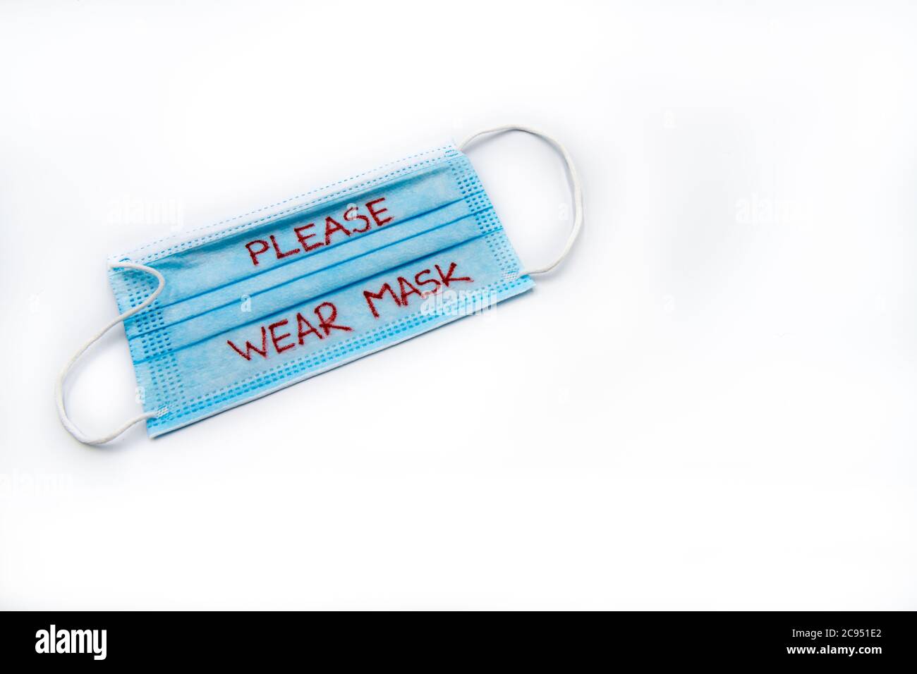 Single use medical face mask with handwritten message Please Wear Mask ...
